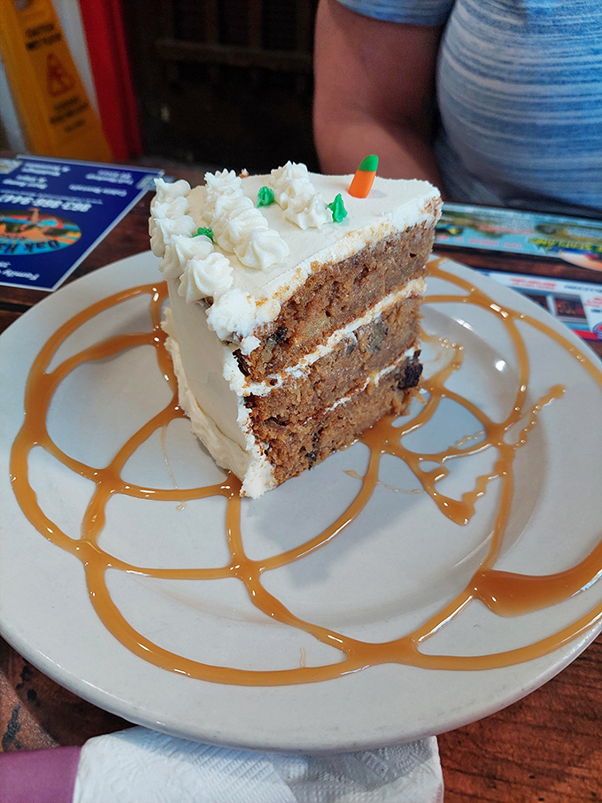 Carrot cake drizzled with caramel sauce&mdash;because after conquering land and sea, your sweet tooth deserves its own adventure.