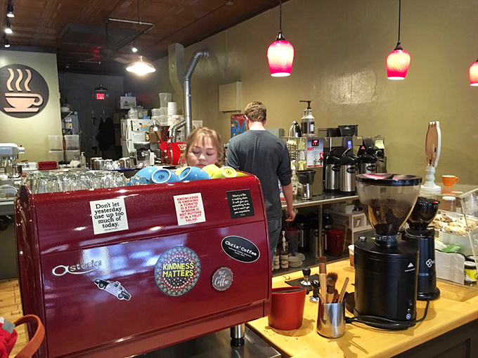 That red espresso machine isn't just equipment&mdash;it's the beating heart of the operation, pumping liquid motivation into the community.