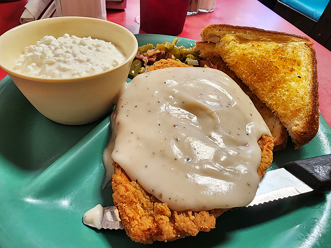 Country fried steak smothered in gravy with a side of nostalgia. Some foods don't need reinvention—they just need to be done right.