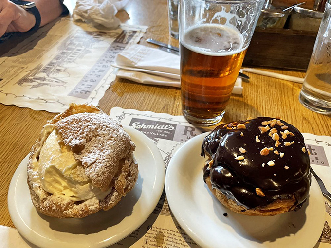 These cream puffs aren't desserts; they're architectural marvels of pastry engineering that happen to taste like heaven.