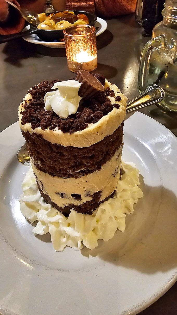 A towering chocolate dessert that demands to be photographed before it's devoured. The kind of sweet finale that makes diets temporarily disappear.