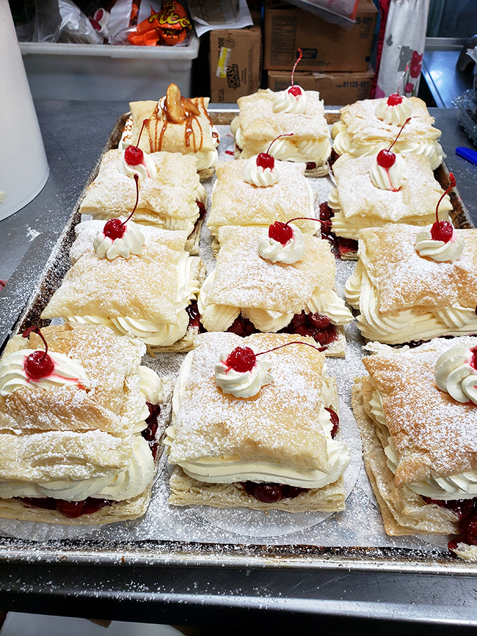 The exterior's weathered charm and straightforward signage tell you everything you need to know: authentic food lives here.