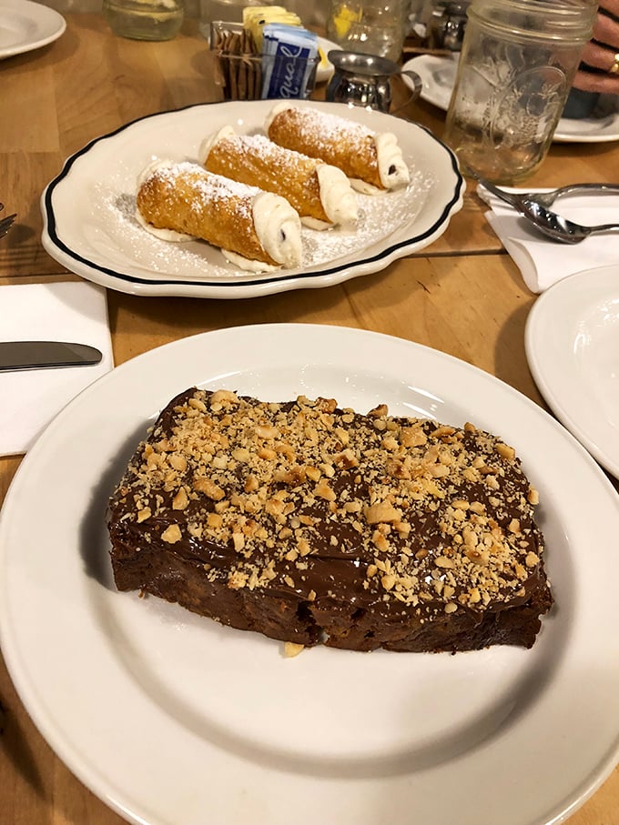 The dessert finale that makes you loosen your belt with zero regrets. Cannoli and chocolate cake that would make even the strictest dietitian look the other way.