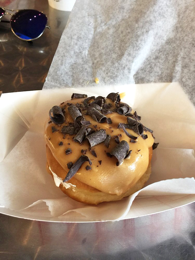 This isn't just a donut&mdash;it's a caramel-glazed, chocolate-topped portal to happiness that fits perfectly in your hand.