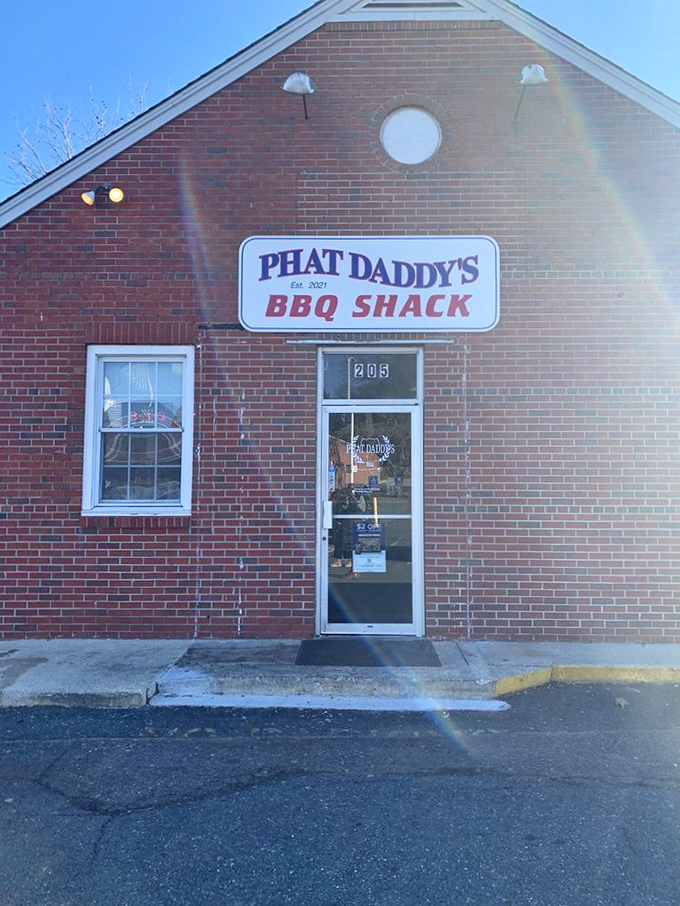 The sign says "Est. 2021," proving great barbecue doesn't require decades of history&mdash;just dedication to the craft and a willingness to play with fire.