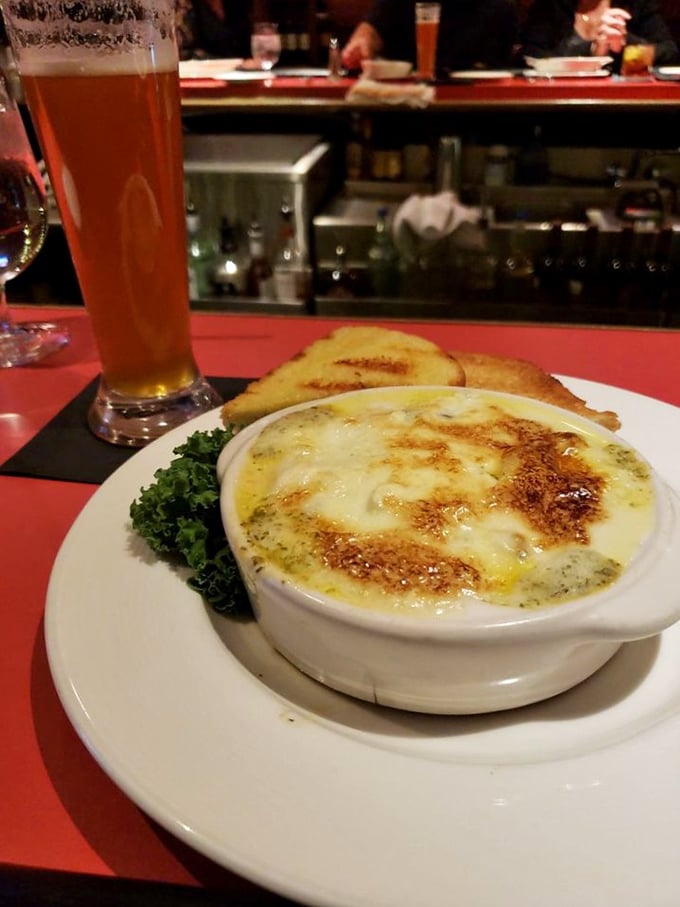 A soup that's dressed better than most people at dinner. That golden crust is the tuxedo jacket on an already elegant dish.