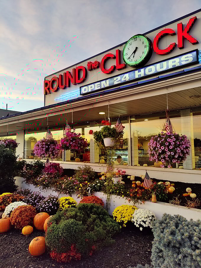 Morning light reveals the diner in all its unpretentious glory. That sign isn't just advertising hours&mdash;it's promising possibility at any time of day. 