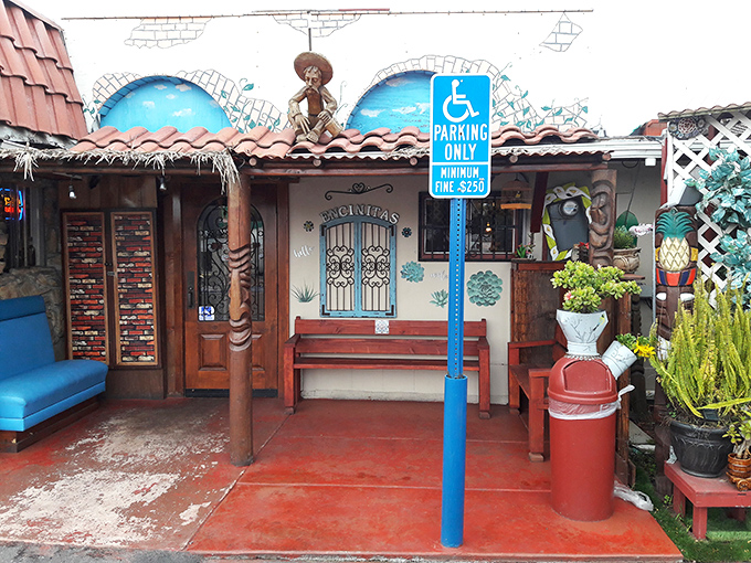 The entrance says "bienvenidos" without needing a word. Those blue benches have heard decades of "mmms" and "oh my gods" from satisfied diners.
