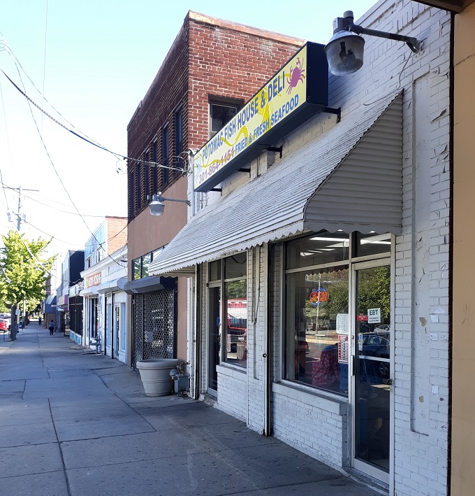 A humble storefront hiding culinary greatness. Like finding a pearl in an oyster, this unassuming exterior conceals delicious treasures within.