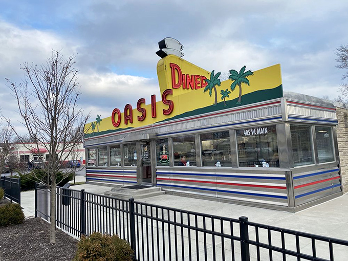 The classic Oasis silhouette with its coffee cup crown stands as proudly today as when chrome-finned cars first pulled up to its door decades ago.