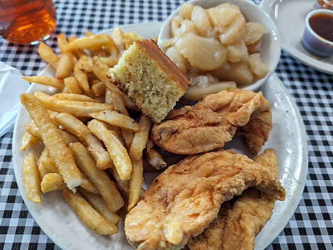 The crispy fish platter arrives with golden fries and cornbread &ndash; proof that mountain folks know their way around seafood too.