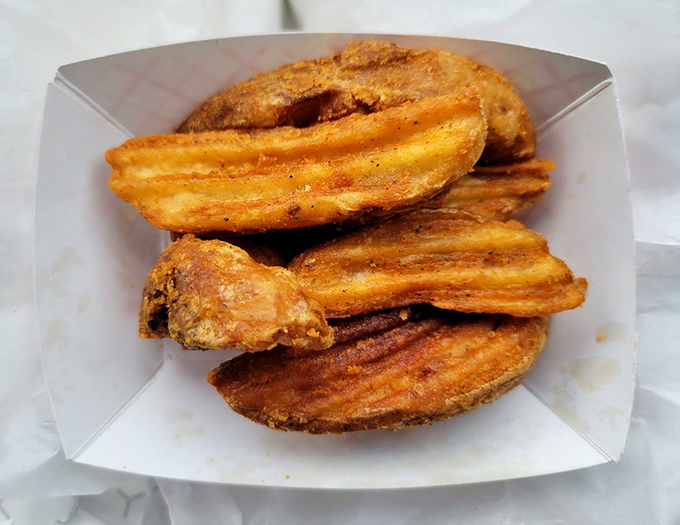 These aren't just french fries&mdash;they're golden, ridged potato treasures with the perfect crisp-to-soft ratio that makes sharing them a true test of friendship.