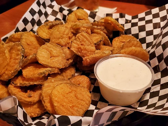 Fried pickles that achieve the impossible: maintaining their crunch while delivering that perfect tangy punch. The ranch dip is just showing off at this point.
