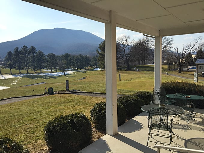 From this porch at Giles Country Club, the mountain view comes free with every conversation, making even average golfers feel like champions.