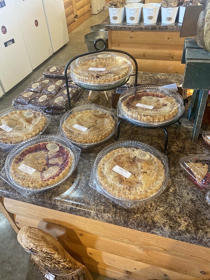 Homemade pies lined up like beauty contestants, each one vying for your attention. The hardest decision you'll make today is which one comes home with you.