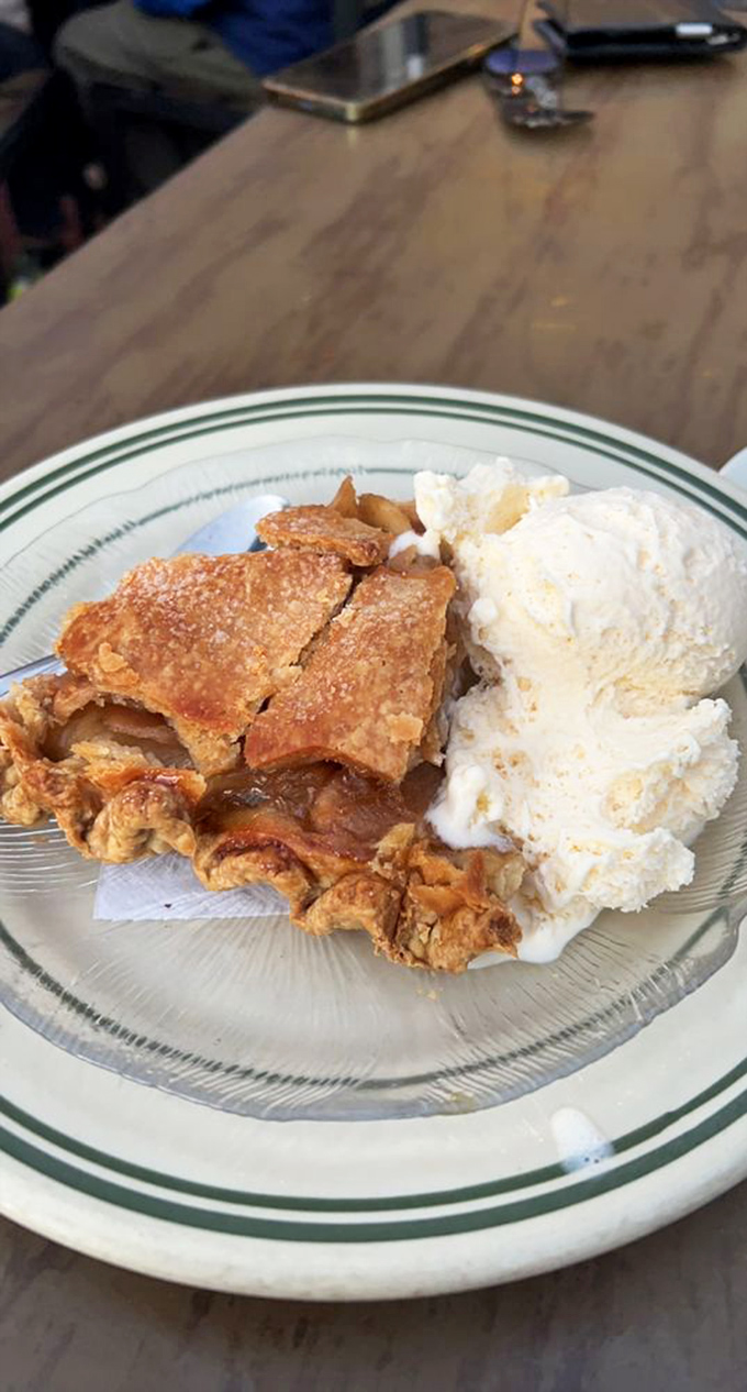 Apple pie and ice cream: the dessert equivalent of a warm hug from your favorite grandparent. The flaky crust practically whispers, "Go ahead, you've earned this."