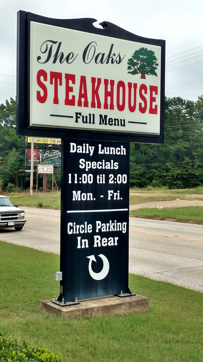The roadside sign doesn't just mark a location&mdash;it's a beacon of hope for hungry travelers. Those lunch specials aren't just meals; they're midday salvation.
