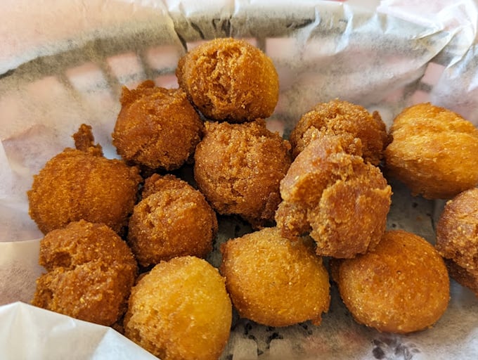 Golden-fried hush puppies&mdash;crispy on the outside, steamy-soft inside&mdash;the Southern sidekick that has silenced hungry customers for generations.