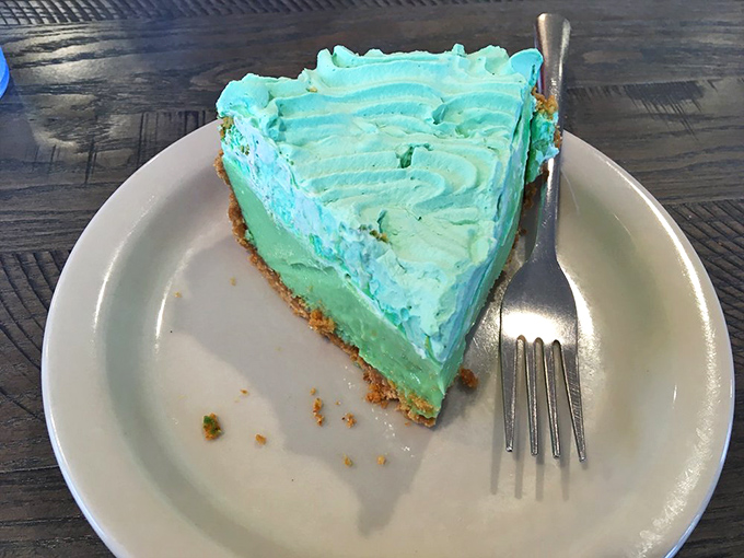 A slice of key lime pie with its vibrant color and graham cracker crust &ndash; the dessert equivalent of a Florida vacation without the sunburn.