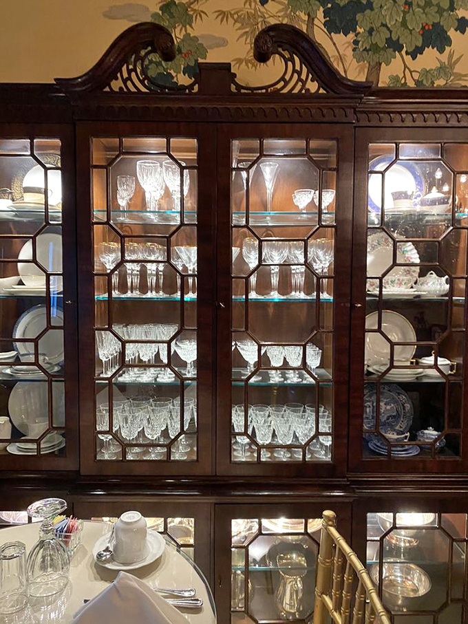 Behind glass cabinet doors, fine china and crystal glassware await special occasions&mdash;a nod to the gracious entertaining traditions of the South.