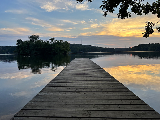 Sunsets at Lake Catherine don't end the day – they celebrate it with a light show worthy of Broadway.