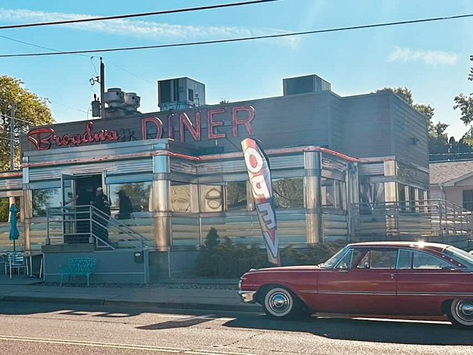 The Broadway Diner's gleaming exterior promises comfort food that your doctor wouldn't approve of but your soul absolutely requires.
