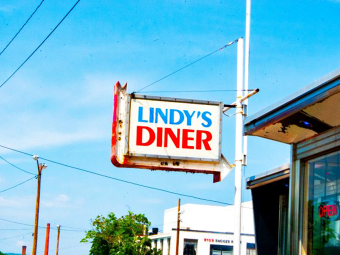 Lindy's Diner sign promises comfort food without pretension. This isn't just a restaurant&mdash;it's a community institution where your coffee cup never stays empty.