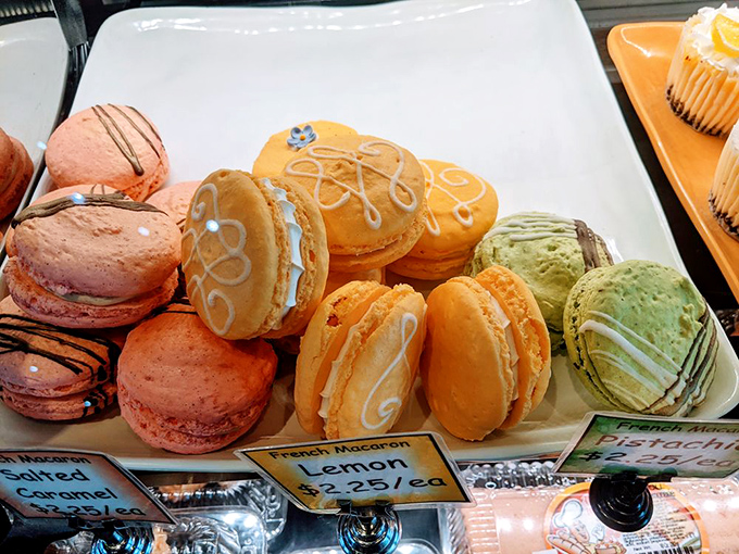 Macarons in vibrant colors line up like edible jewels. They're the dessert equivalent of finding the perfect accessory for your meal.