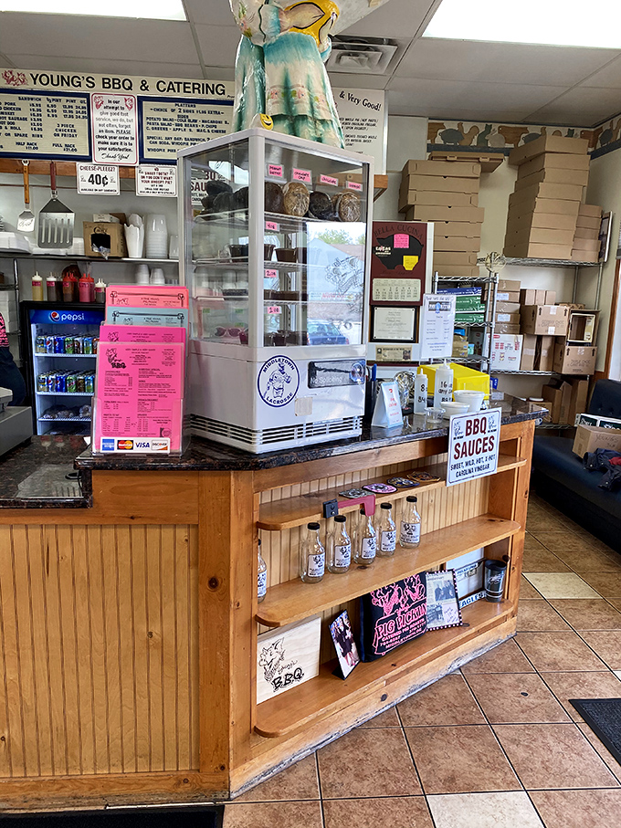 Sauce bottles lined up like trophies on a shelf. From sweet to hot, these house-made concoctions let you customize your barbecue experience.