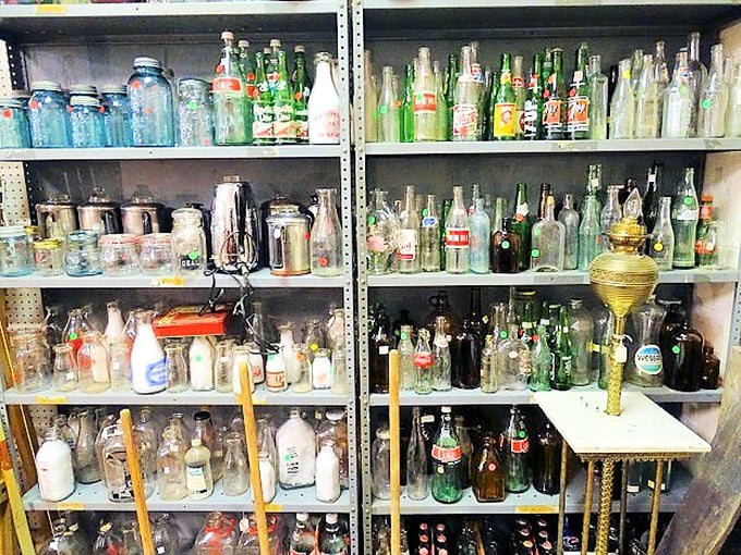 The bottle collection that would make any archaeologist or soda enthusiast weak at the knees. Each glass vessel tells a story of American consumption.