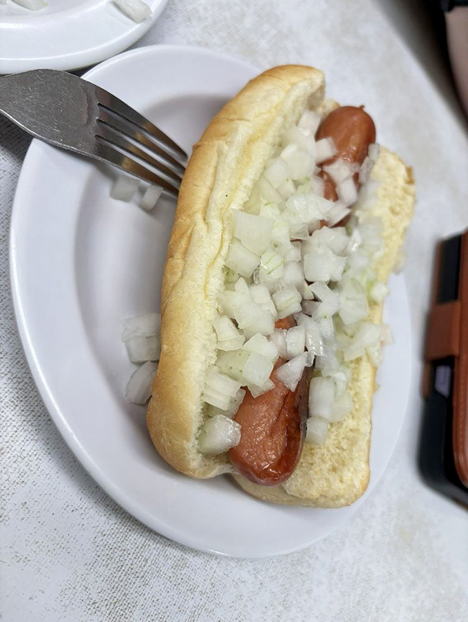 The naked truth &ndash; even before the chili baptism, Lafayette's dogs and fresh onions promise a beautiful beginning to the perfect Coney experience.