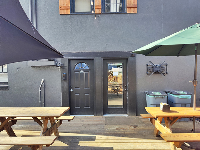 The outdoor seating area &ndash; where mountain air seasons every bite and strangers become friends over shared tables and sandwich recommendations.