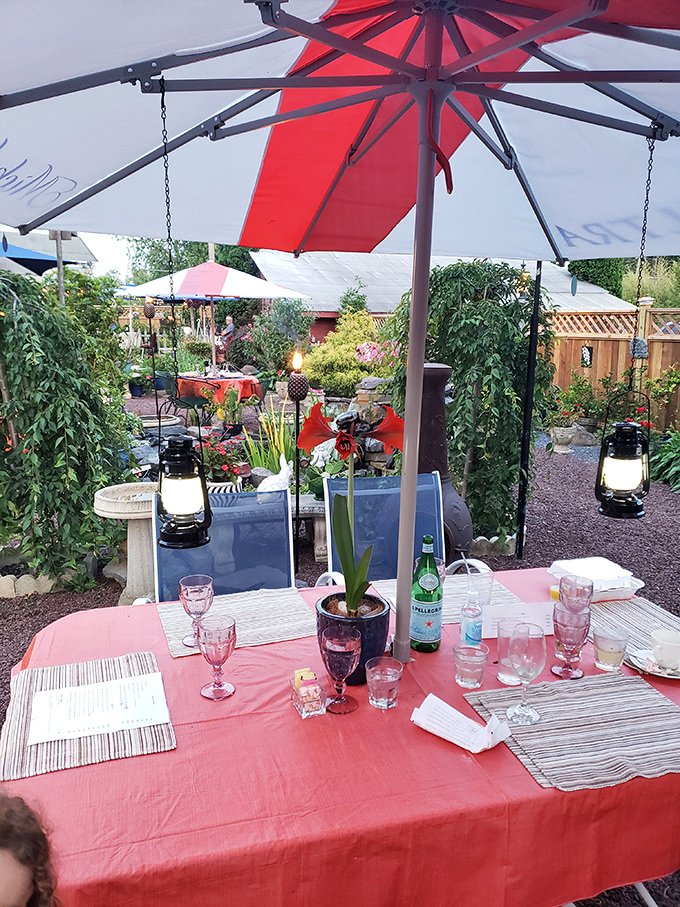 The garden patio invites you to dine under the stars, where string lights compete with fireflies to illuminate your evening feast. 