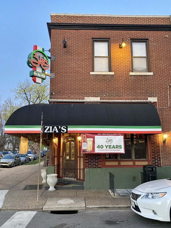 Forty years of serving The Hill's finest Italian cuisine, and that neon sign still glows with promise as the evening sky darkens. Some traditions deserve to last forever.