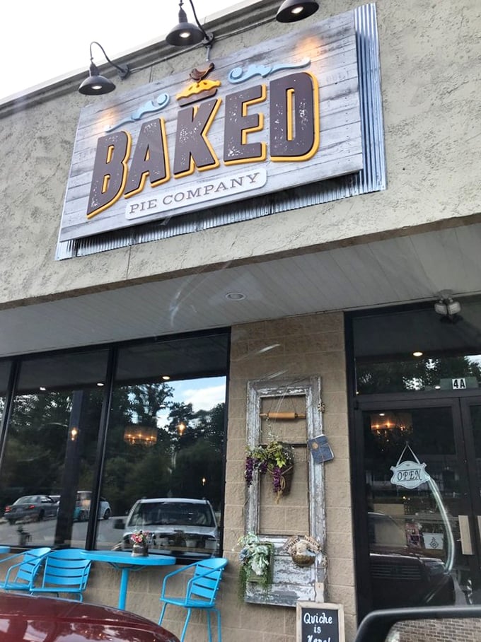 Blue sidewalk seating invites you to enjoy your slice in the fresh mountain air, though few can wait that long.