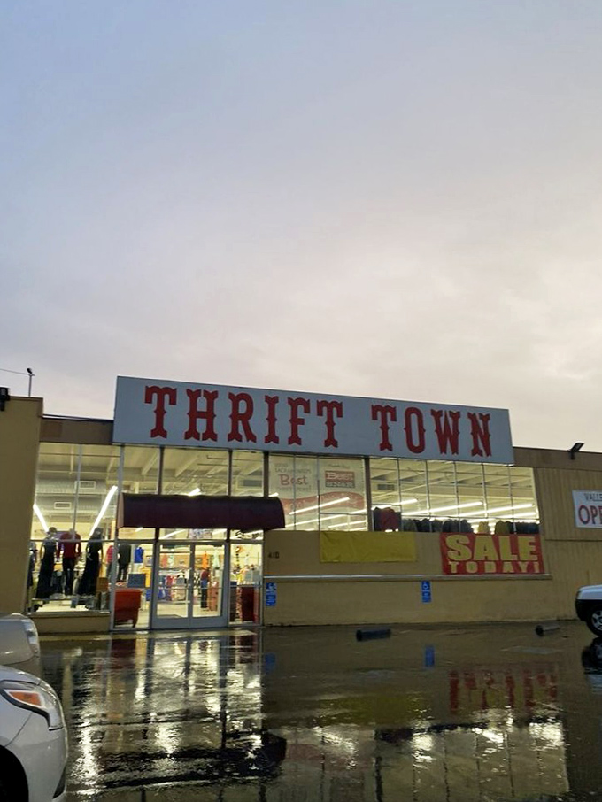 Even on rainy days, the Thrift Town sign glows with promise. Sacramento's secondhand superstore stands ready for another day of recycled retail therapy.