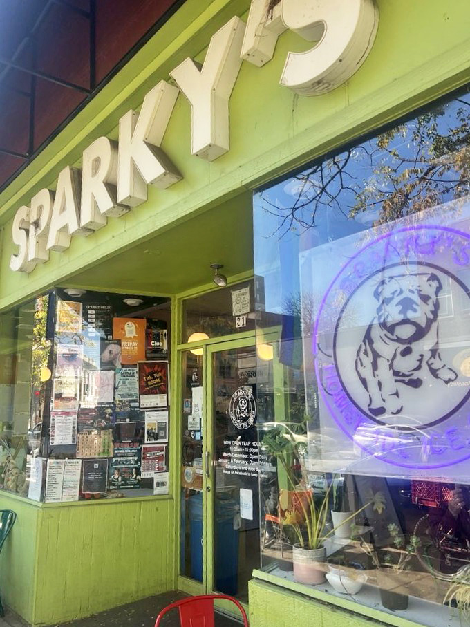 The bulldog logo watches over Ninth Street like a frozen treat guardian, inviting passersby into this lime-green temple of ice cream.