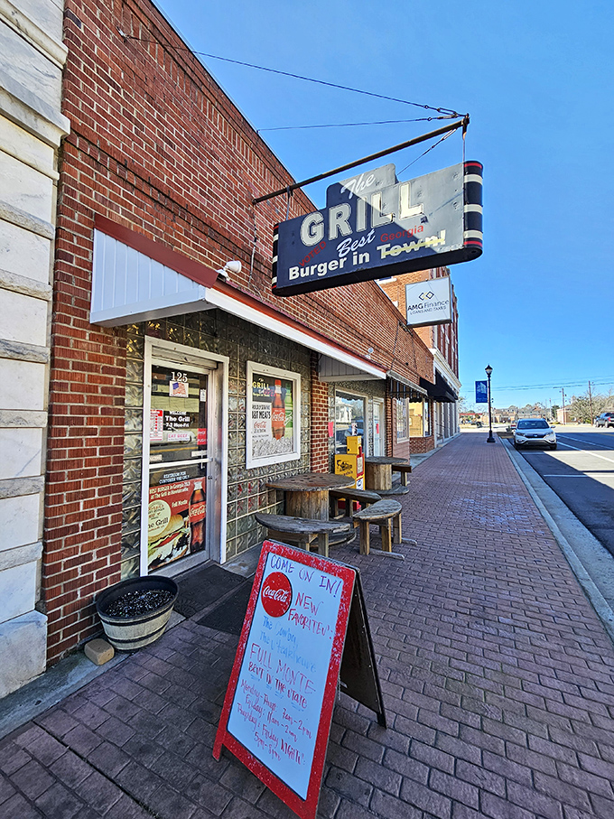 The sidewalk sign beckons like an old friend: "Come on in!" And really, with burgers this good, how could you possibly refuse?