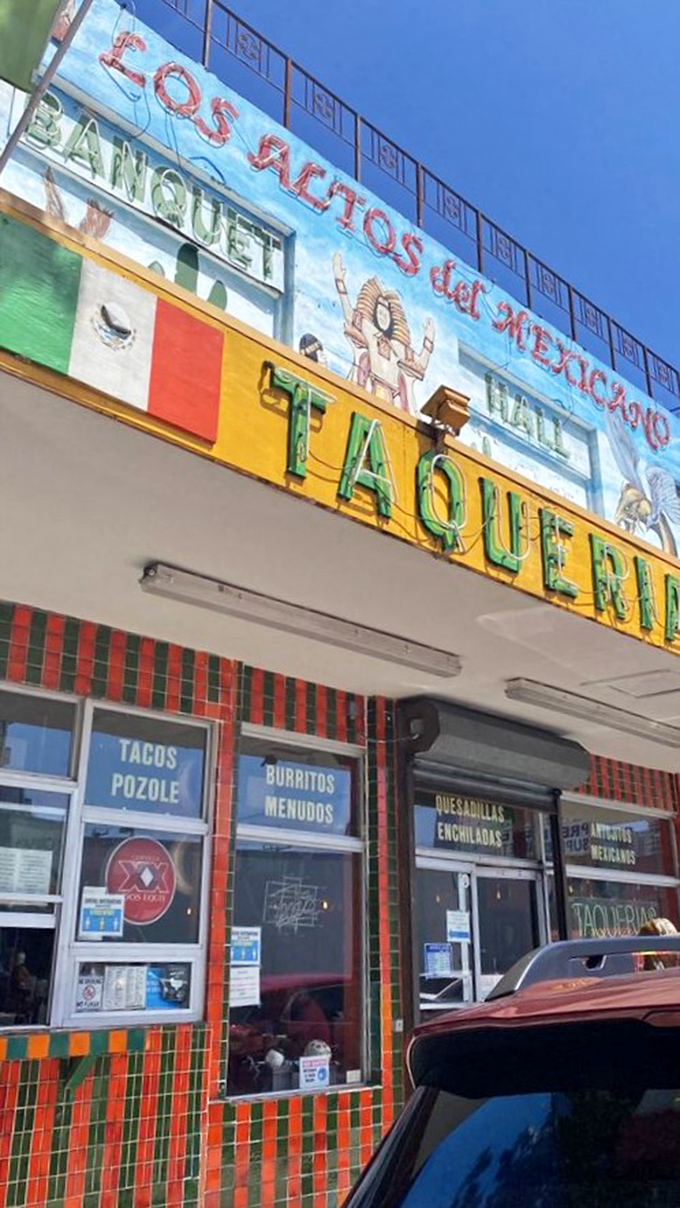 The sign promises tacos, pozole, burritos, and menudos, but what it really offers is a ticket to Mexico without the airfare or passport check.