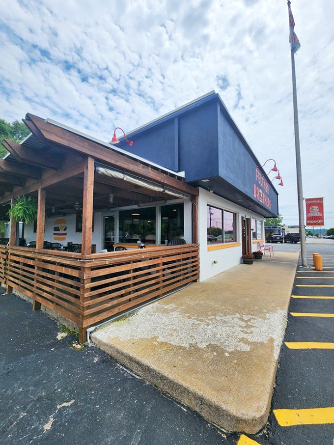 Feltner Brothers' welcoming façade and outdoor seating area invite passersby to stop and stay awhile for a taste of hot dog paradise.