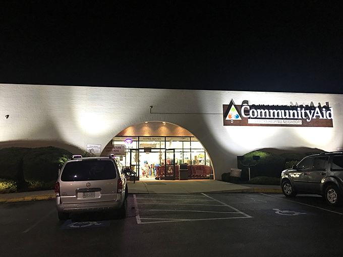 Night falls but the thrifting continues. The illuminated sign isn't just a logo&mdash;it's a beacon for bargain hunters who know where the good stuff goes.