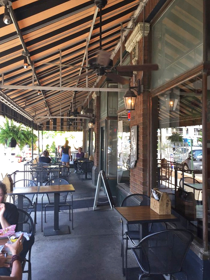 The outdoor patio at 317 Burger&mdash;where fresh air enhances flavor and nobody judges you for making those involuntary happy food noises.