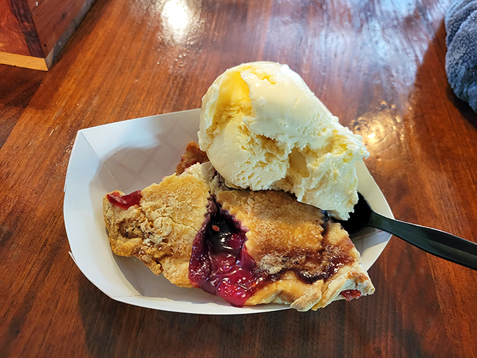 The perfect finale &ndash; a slice of homemade pie with ice cream melting into warm fruit filling, worth every mile of the journey.