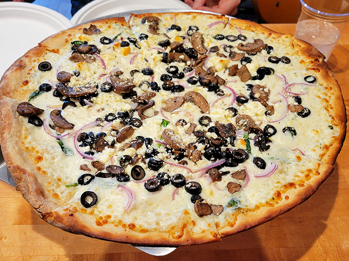 Yes, they serve pizza too! Because sometimes you need something savory before diving headfirst into sweet, creamy oblivion.