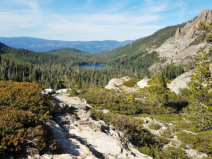 Alpine lakes nestled among granite peaks create the kind of view that makes smartphone photographers temporarily believe they're Ansel Adams.