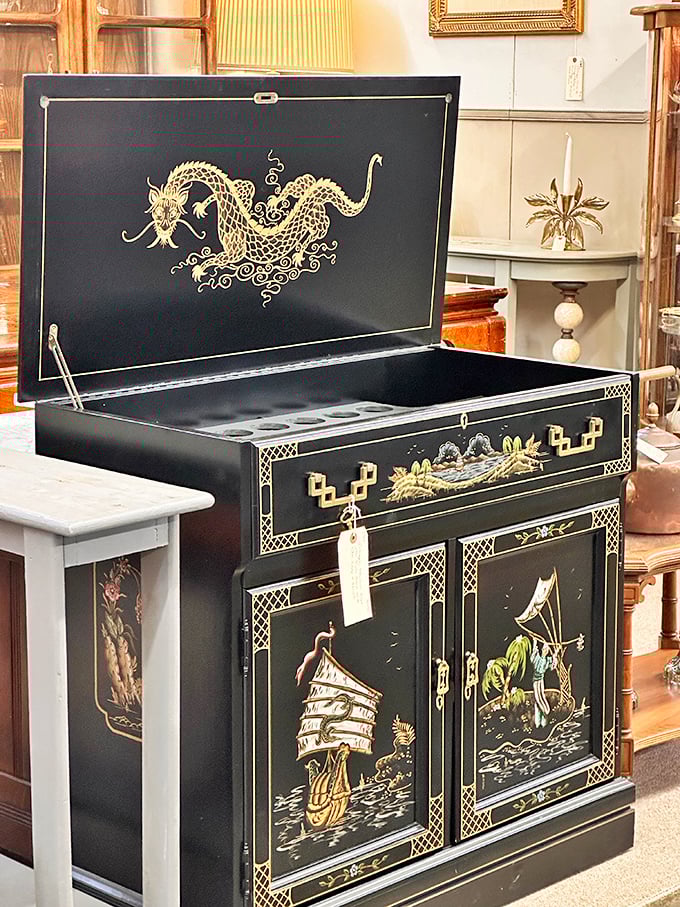 This black lacquered cabinet with gold dragon artwork combines Eastern artistry with Western functionality. The perfect conversation piece for people who actually enjoy conversations.