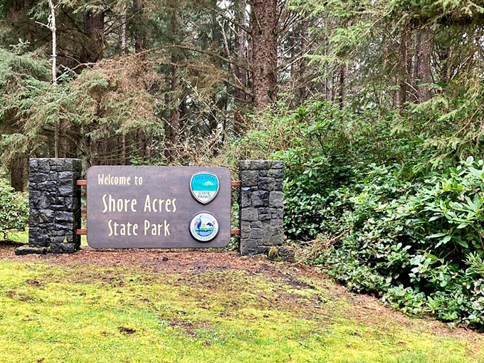 The unassuming entrance sign that marks the threshold between ordinary life and coastal magic&mdash;Oregon's version of "Open Sesame." 