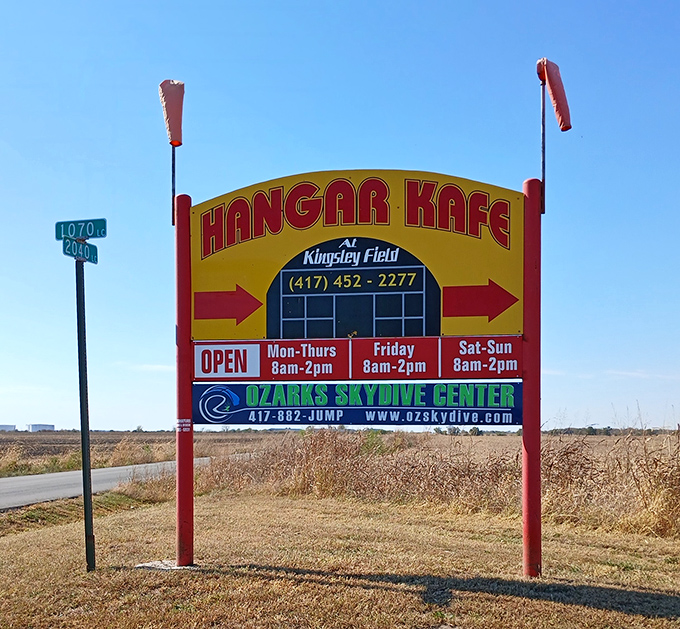 The roadside sign promises more than just a meal&mdash;it's an invitation to a uniquely Missouri experience where runways meet comfort food.