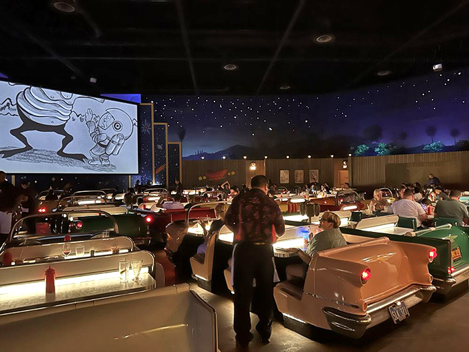 Where else can your server navigate between tail fins and chrome bumpers while delivering burgers? Only in this wacky wonderland.