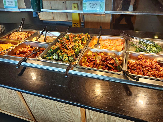 The hot food section &ndash; where steam rises like culinary fog over a landscape of stir-fried delights. Vegetables never had it so good.